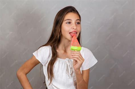 Girl Sucking Popsicle