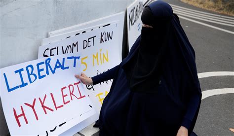 Hundreds Protest In Denmark As Ban On Face Veils In Public Takes Effect