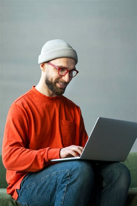 Premium Photo Smiling Successful Man Programmer Using Laptop Typing