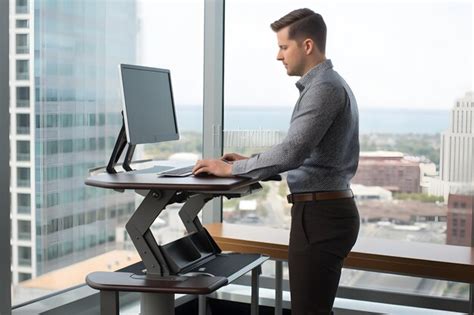 Premium Ai Image Ergonomic Office Setup With A Sitstand Desk