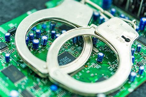 Cybercrime The Concept Of Cybercrime Handcuffs Lie On A Computer