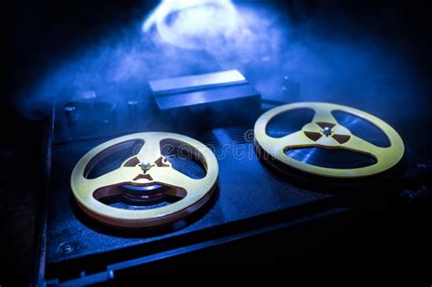 Old Vintage Reel To Reel Player And Recorder On Dark Toned Foggy
