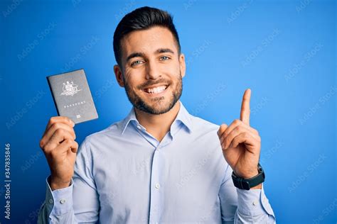 Young Handsome Tourist Man Holding Australia Australian Passport Id