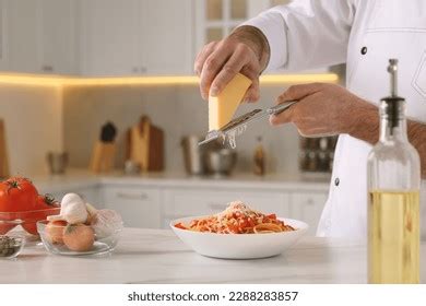 Professional Chef Grating Cheese Into Delicious Stock Photo 2288283857