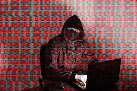 premium photo man in hoodie is hacking personal data information
