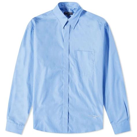 Comme Des Garçons Homme Mens Hem Logo Shirt In Sax Comme Des Garcons Homme