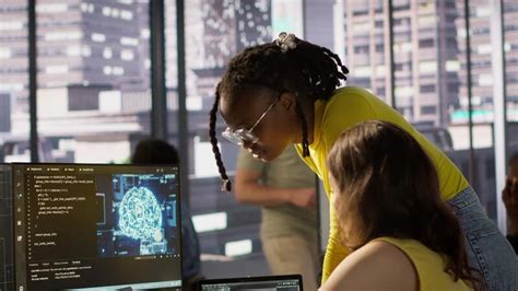 Admin assisted by coworker while utilizing cloud computing resources to ...