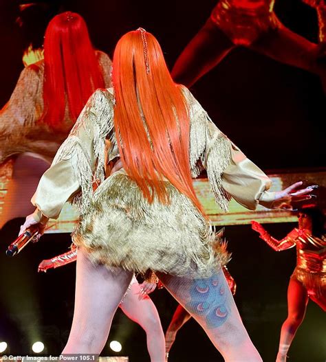 Cardi B Flaunts Cleavage In Gold Ensemble As She Performs At Star