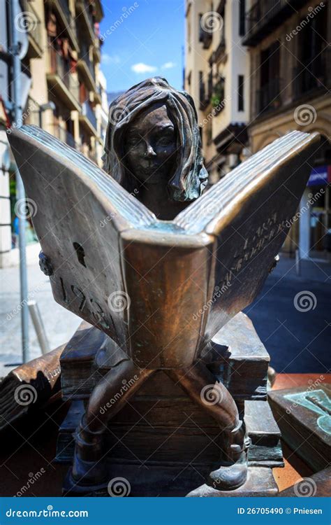 Bronze Statue Of Girl Sitting On Books Reading Editorial Image Image