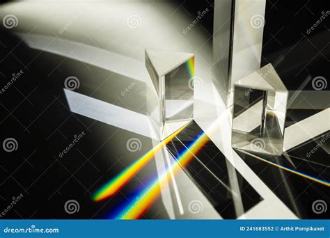 Multi Triangular Prism Dispersing Sun Beam Splitting Into A Spectrum On White Background Stock