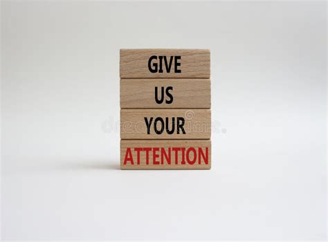 Attention Symbol Concept Word Give Us Your Attention On Wooden Blocks