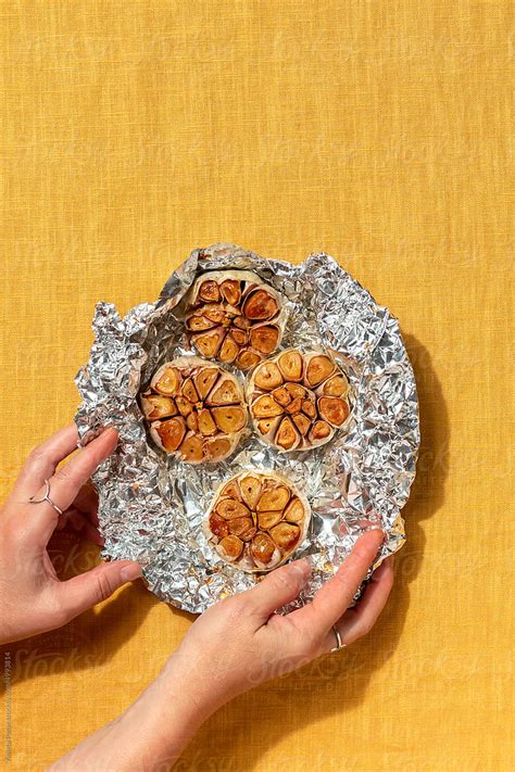 Roasted Garlic By Stocksy Contributor Violeta Pasat Stocksy