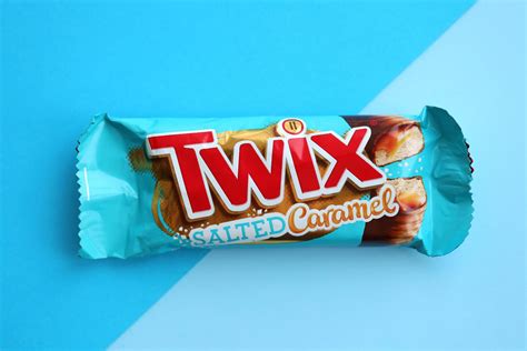 Ternopil Ukraine July 7 2023 Twix Salted Caramel Blue Wrapper On Wooden Background Twix Is
