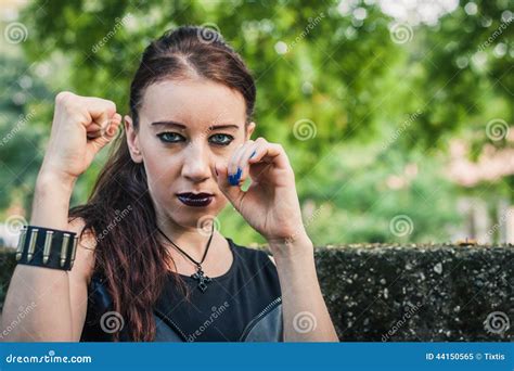 Pretty Goth Girl Choked By Two Hands Royalty Free Stock Image