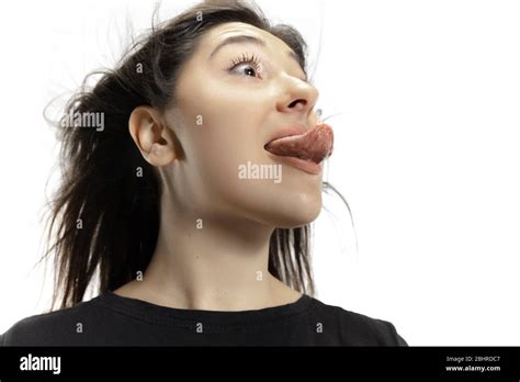 Smiling Girl Opening Her Mouth And Showing The Long Big Giant Tongue