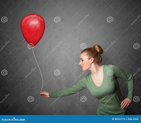 Woman Holding A Red Balloon Stock Image Image Of Balloons Look 88543715