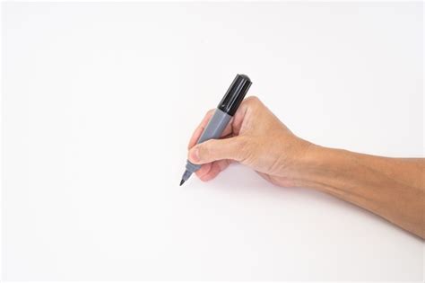Premium Photo Man Hand Holding Black Magic Marker Pen Writing On