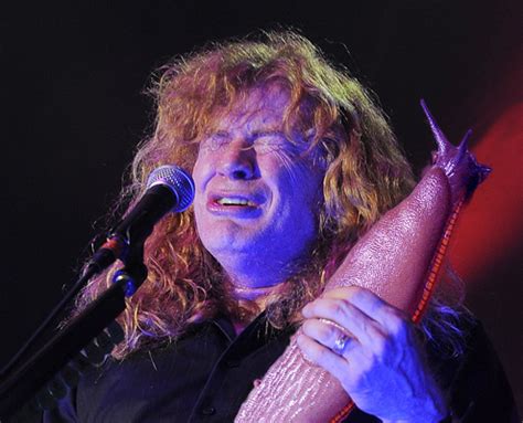 Here Are A Bunch Of Guitarists Playing Giant Slugs Instead Of Guitars