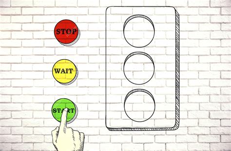 premium photo sketch of hand pressing green go button on brick
