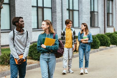 Teenagers Walking In Park Stock Image Image Of Attractive 100178893