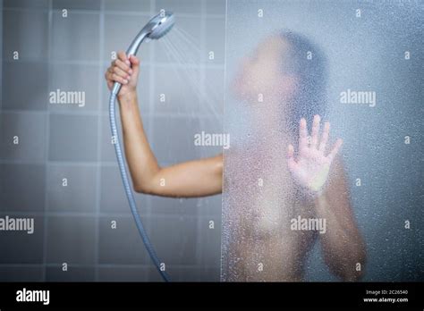 Woman Taking A Long Hot Shower Washing Her Hair In A Modern Design