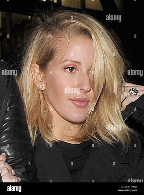 Ellie Goulding Tries To Hide Her Face From The Cameras For The Second