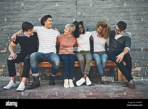 The Bench Of Perpetual Friendship Shot Of A Diverse Group Of People
