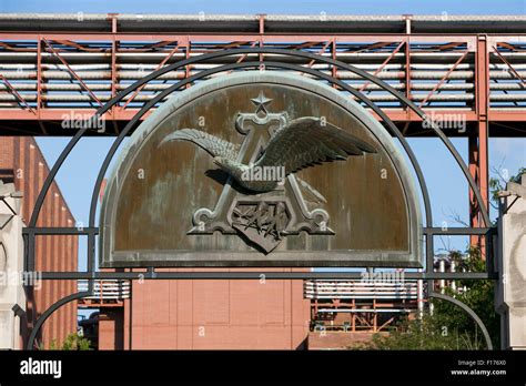 A Logo Sign Outside Of The Headquarters Of The Anheuser Busch Companies