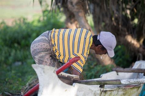 Premium Photo Side View Of Person Holding Hat