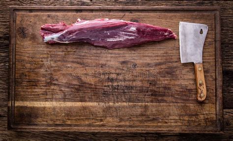 Raw Beef Meat Raw Beef Tenderloin Steak On A Cutting Board With