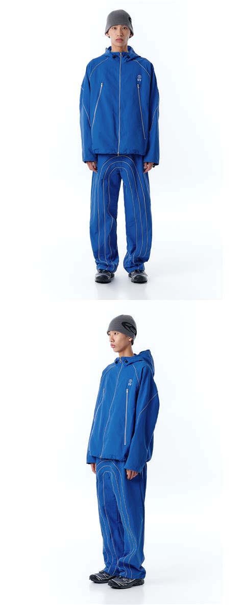 오와이 파이핑 커브 라인 트랙 팬츠 블루 Oy Kream