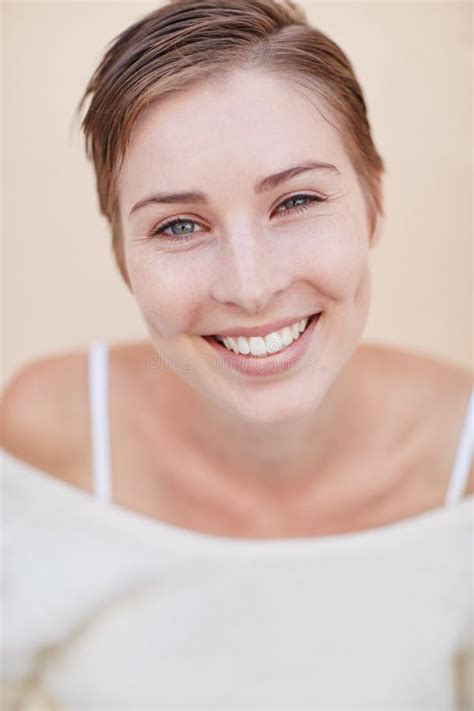 Dont Worry Just Be Happy Portrait Of A Smiling Young Woman Alone At