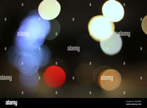 Beautiful Colorful Bokeh Balls Bouncing Around As City Lights Stock