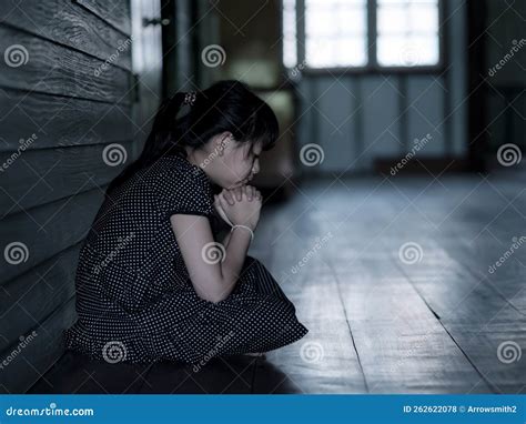 Girl Sitting Down Crying
