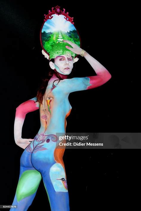 A Model Poses With Her Bodypainting Designed By Bodypainting Artist