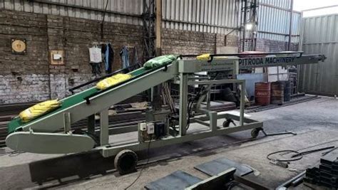 Belt Type Mild Steel Truck Loading Conveyor In Jamnagar Capacity 100 Kg Feet Material
