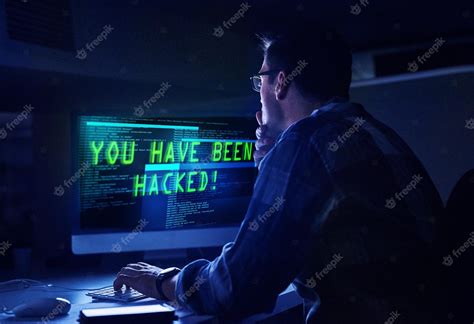 Premium Photo He Knows How To Handle A Hacker Rearview Shot Of A