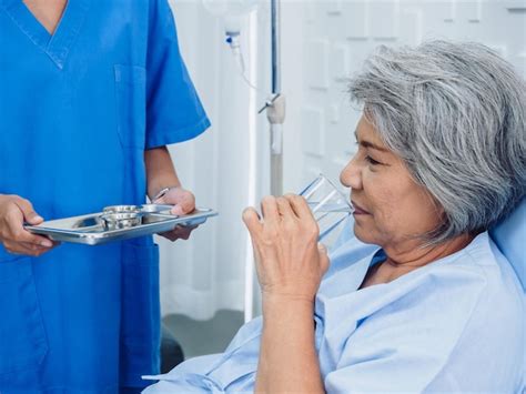 Premium Photo Asian Elderly Patient Taking Medicine Hold Drinking