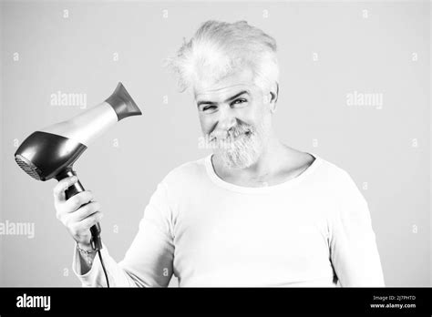 Blonde Bearded Man Hair Dry Young Man Drying Hair With Hairdryer Stock