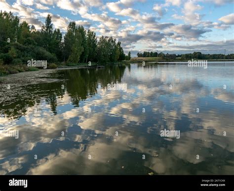 Landscape With Beautiful Cloud Reflections Of Lake Water Calm Water