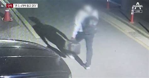 단독 라덕연 투자 자문회사 압수수색 전“휴대전화 3 4개씩 들고 갔다”