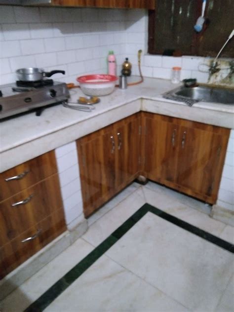 Kitchen Storage Designs By Carpenter Madhu Mukul Gautam Buddh Nagar