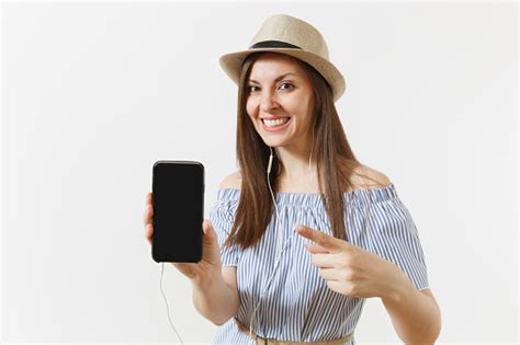 영 빈 블랙 빈 화면을 흰색 배경에 고립 이어폰 휴대 전화에 행복 한 여자 듣기 음악을 재미 사람들 진지한 감정 라이프 스타일