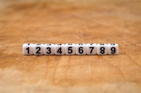 Premium Photo Cube Words On The Wooden Table
