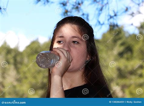 A Beautiful Teenage Girl Drinking Water Stock Image Image Of