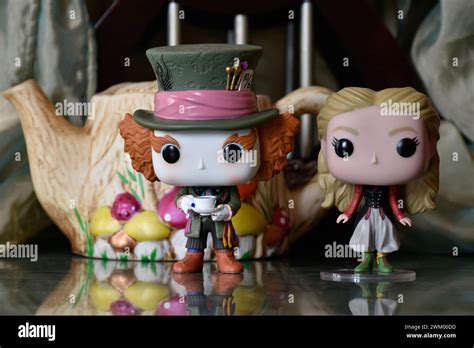 Funko Pop Action Figures Of Mad Hatter And Alice In Wonderland Palace