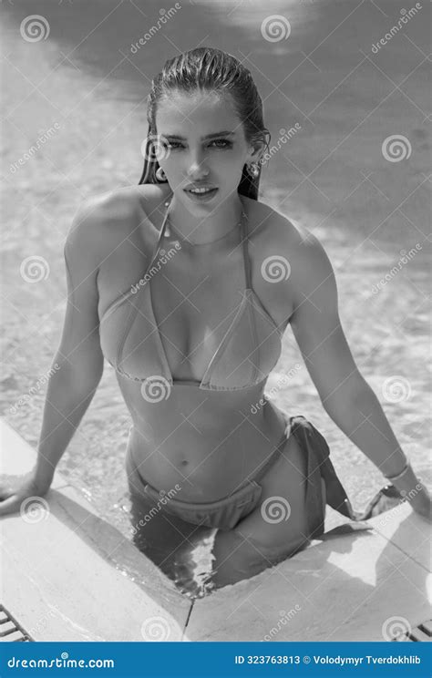 Attractive Young Sensual Lovely Woman In Bikini Swimming And Relaxing