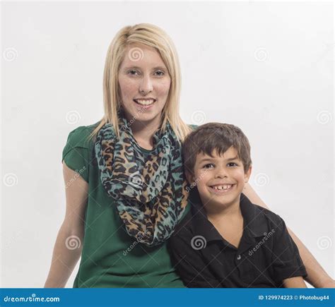 Young Mother And Interracial Son On White Background Stock Image