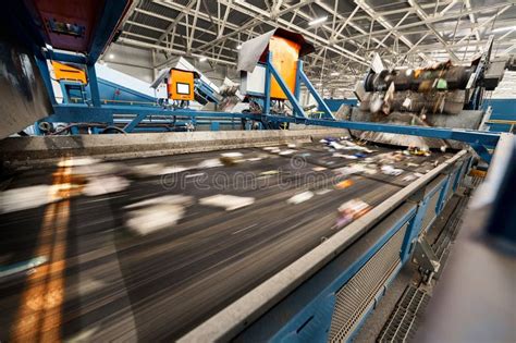 Wide Belt Conveyor With Moving Debris Waste Sorting Plant Stock Photo