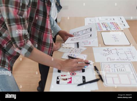 Close Up Ux Developer And Ui Designer Brainstorming Interface Wireframe Designcreative Digital